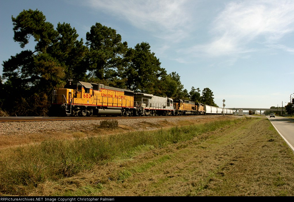 UP 682, UPY 149, HLCX 6145, and UP 3391